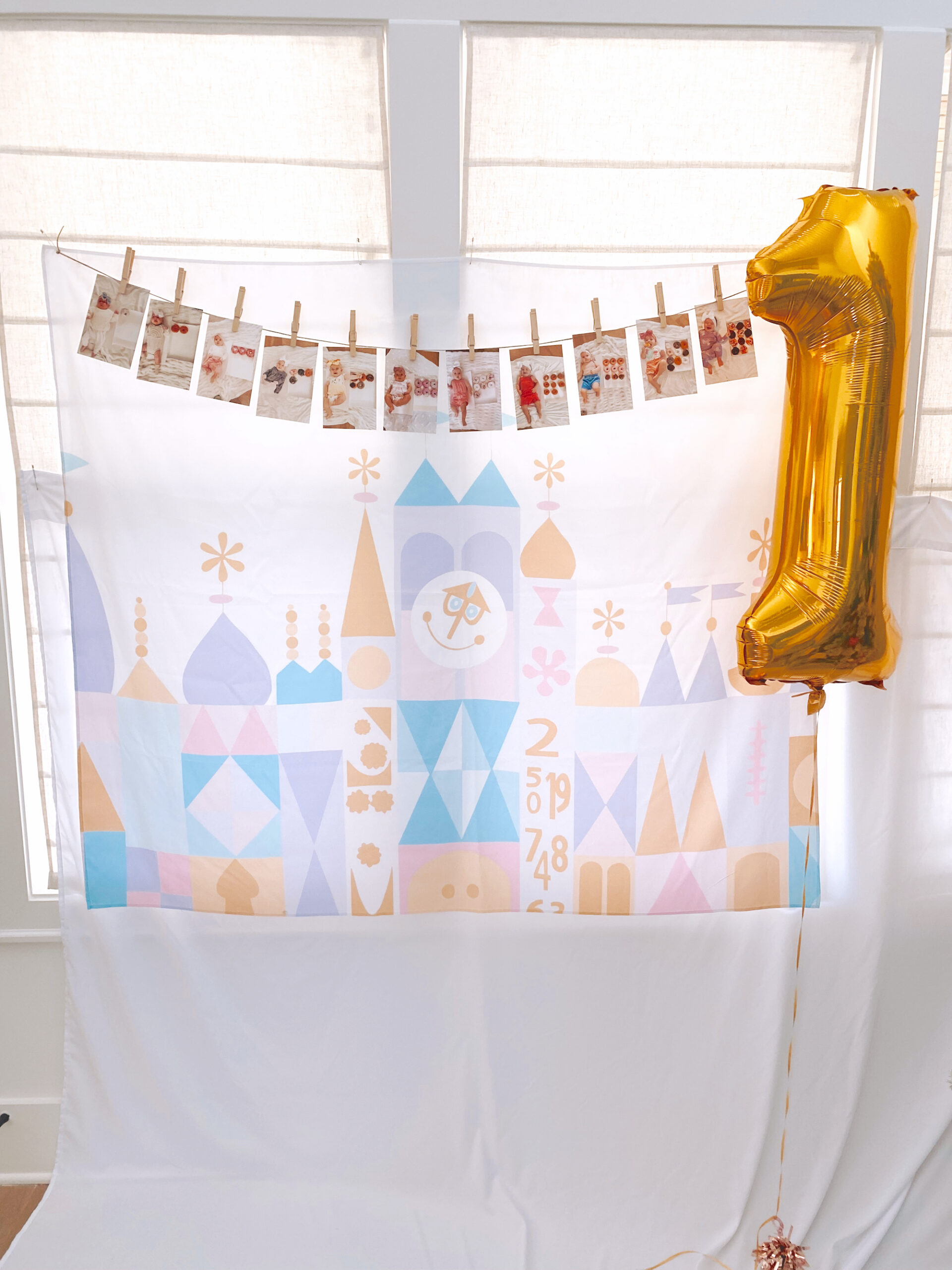 Rowen’s first birthday + it’s a small world birthday theme - Bre Pickett